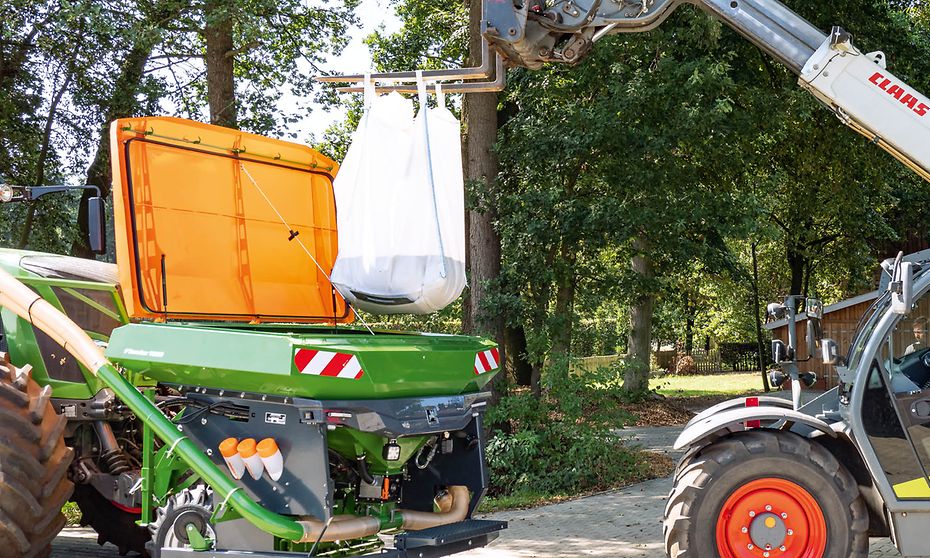 Avant mounted seed drill combination with FTender mounted front hopper